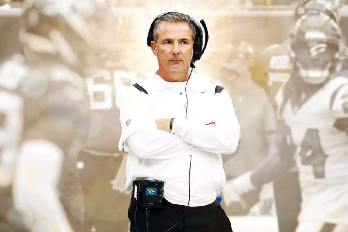 Urban Meyer û Xilaskarê Rahênerê Fûtbolê yê Kolejê