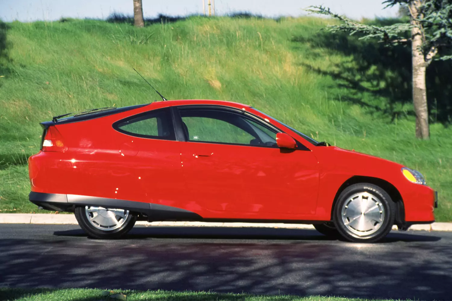 2002 Honda Insight a cikin Sabuwar Formula Red