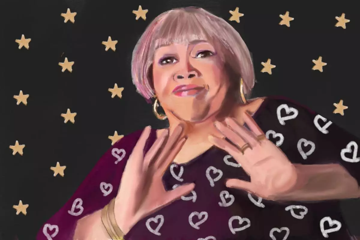 Mavis Staples yana tsaye a gaban bayanan taurari